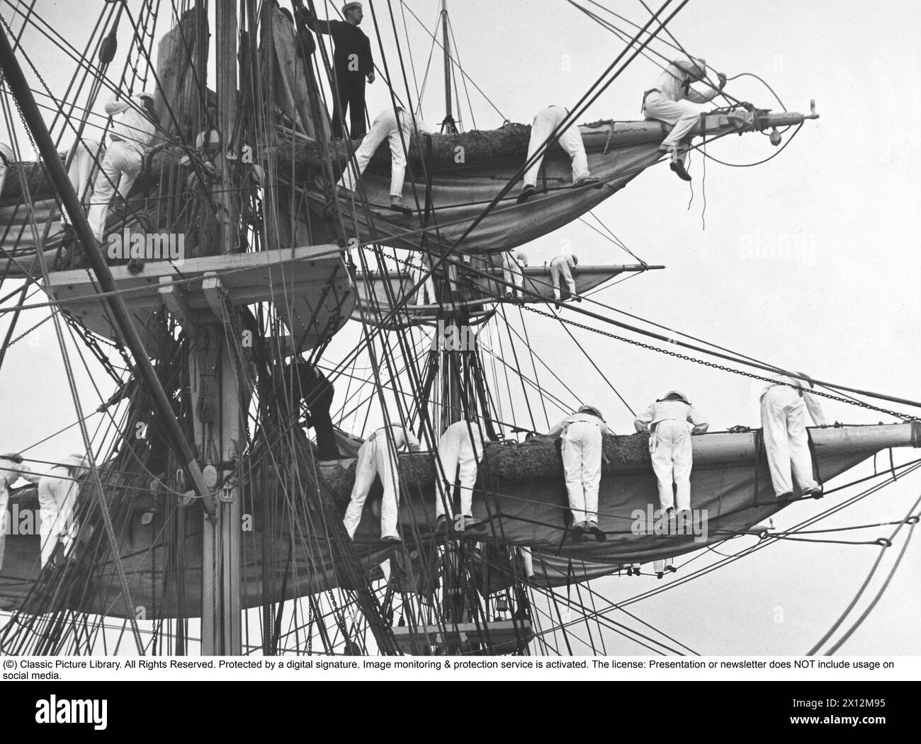 The sailing ship Jarramas. Sailors are seen climbing the rigging of the ...