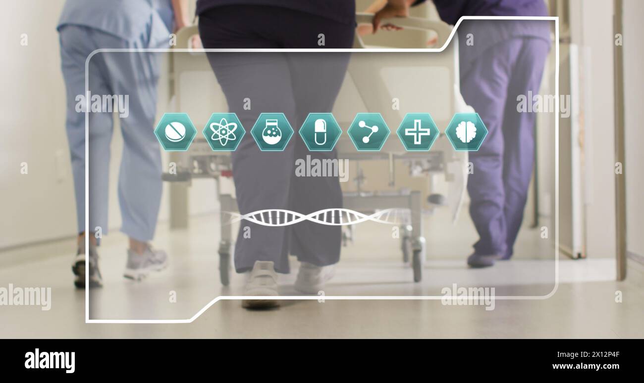 Image of dna strand and icons over diverse doctors at hospital Stock ...