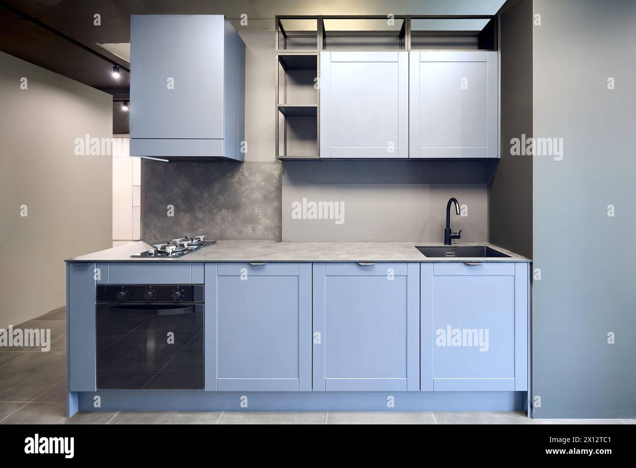 Blue gray contemporary kitchen linearlayout with hood, two burners gas ...