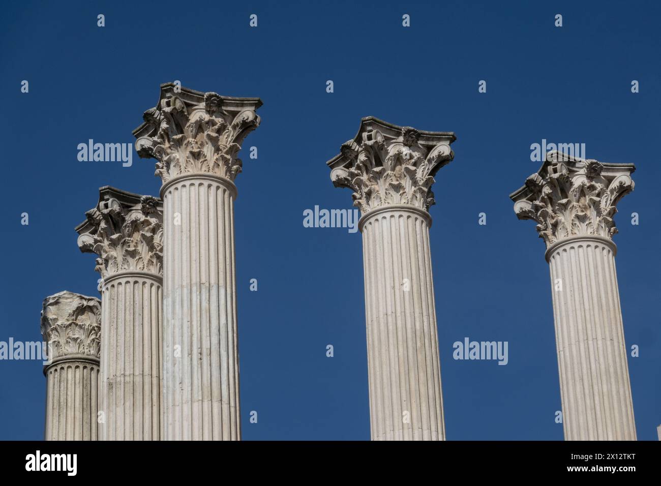 Ancient Roman columns isolated over blue sky, in Córdoba, Andalusia ...