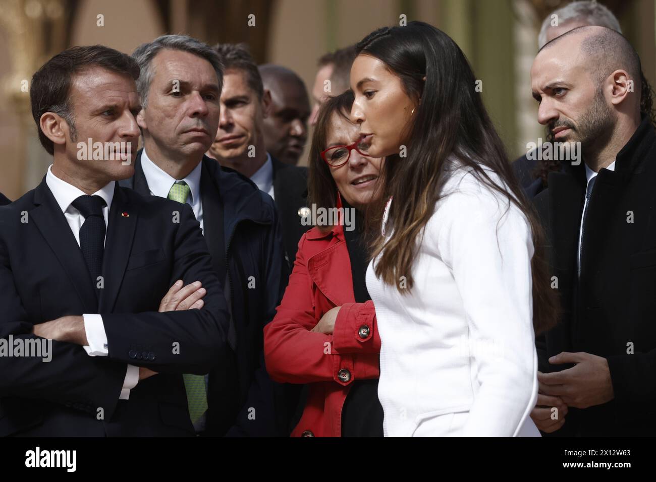 French President Emmanuel Macron talks with French Fencing champion ...