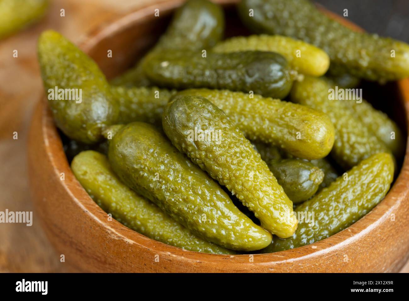 green pickled cucumbers on the table, crispy salted pickled cucumbers ...