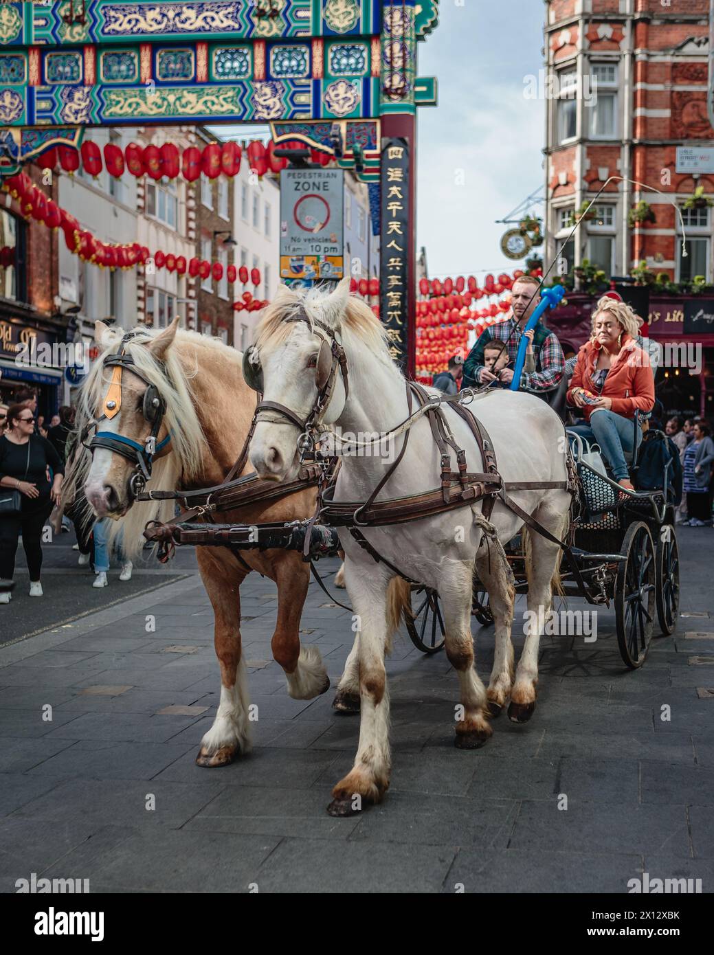 Roma and traveller people parade horses and carts through Chinatown in ...