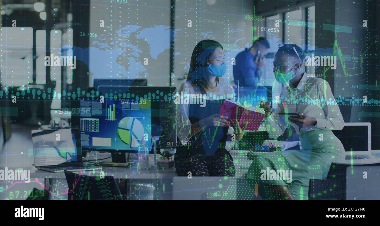 Image of data processing over diverse business people in face masks in office Stock Photo - Alamy