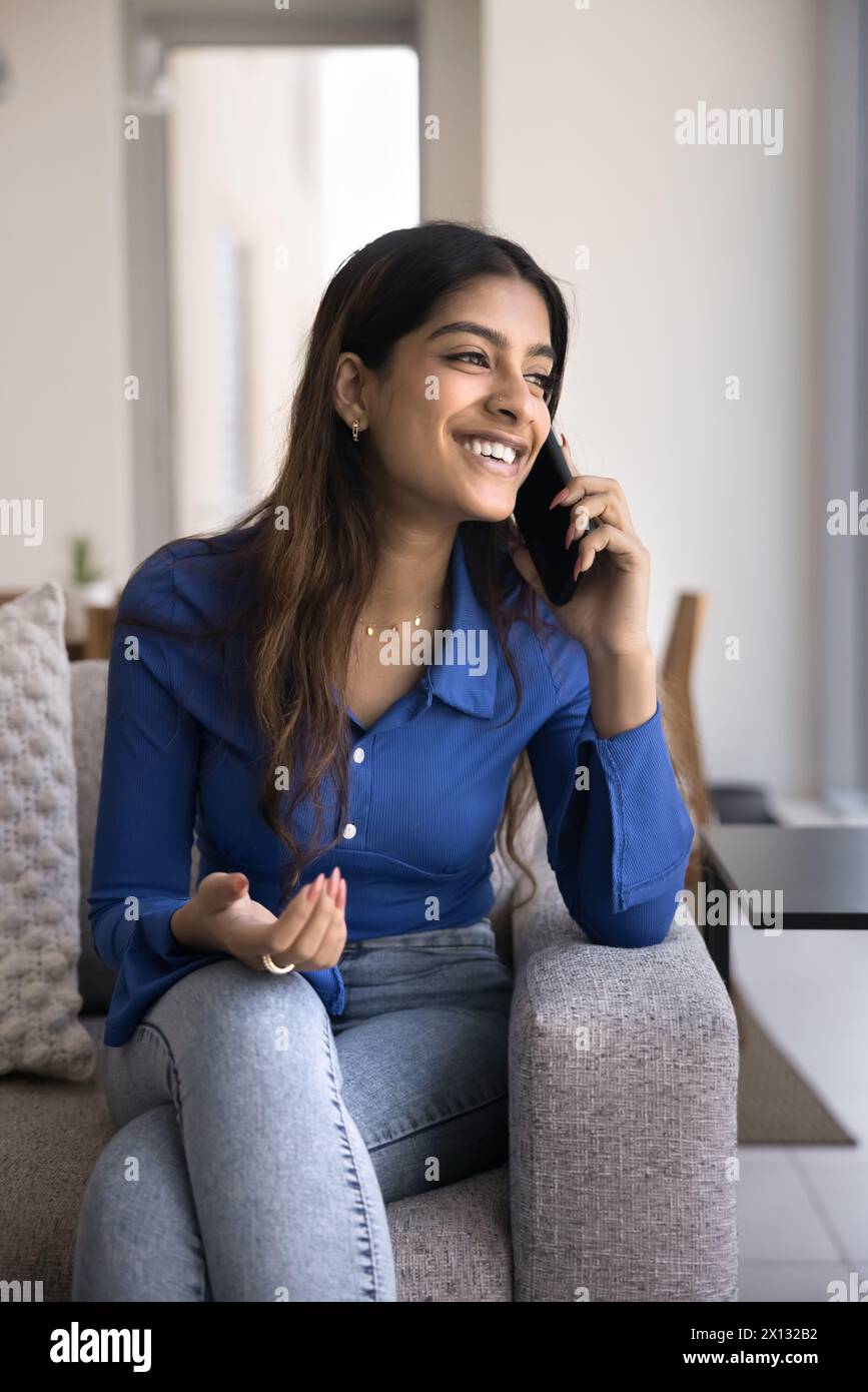Happy joyful beautiful Indian woman enjoying mobile phone call Stock ...