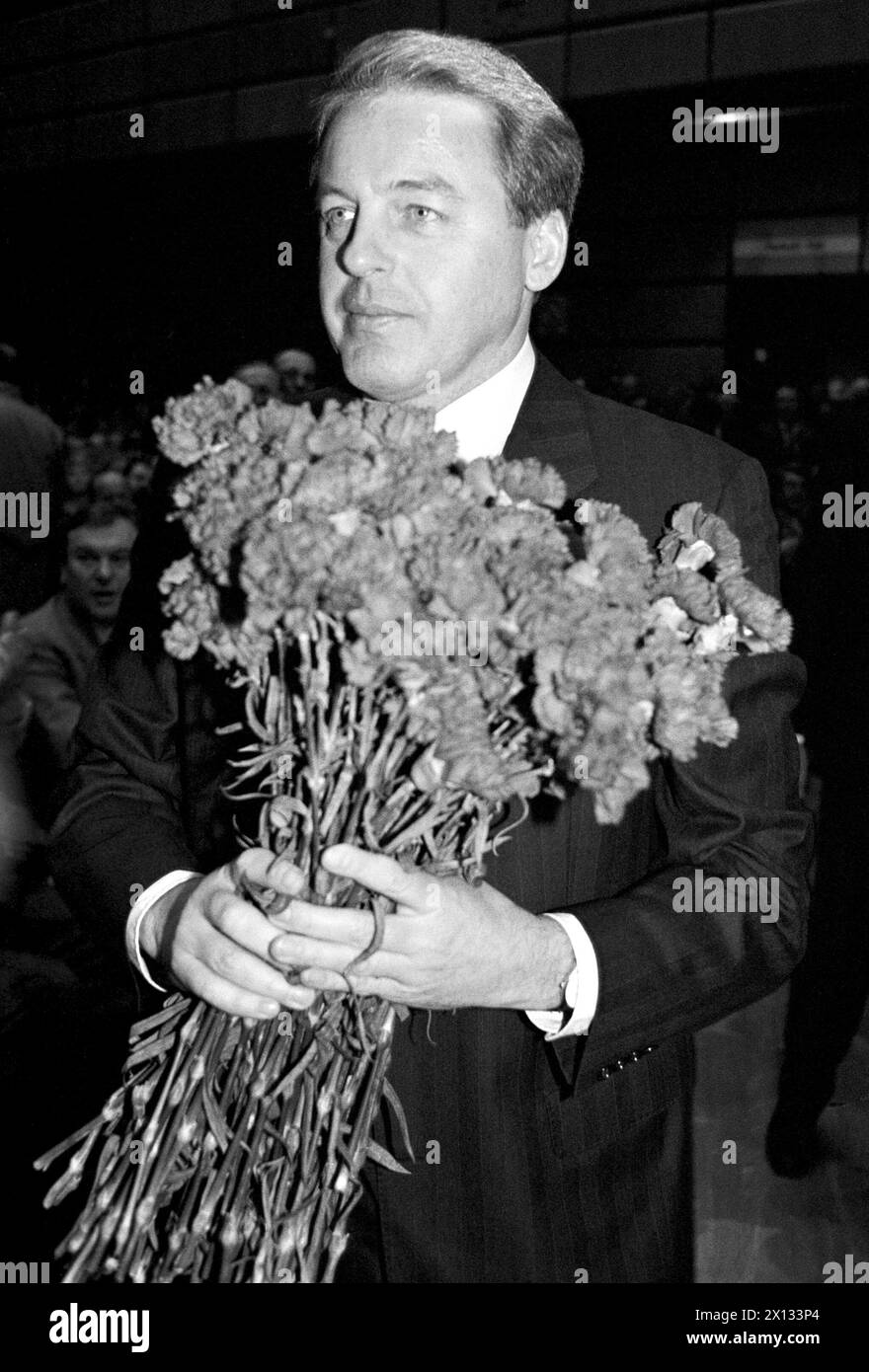 Austria's Federal Chancellor Franz Vranitzky with a bouqet of red ...