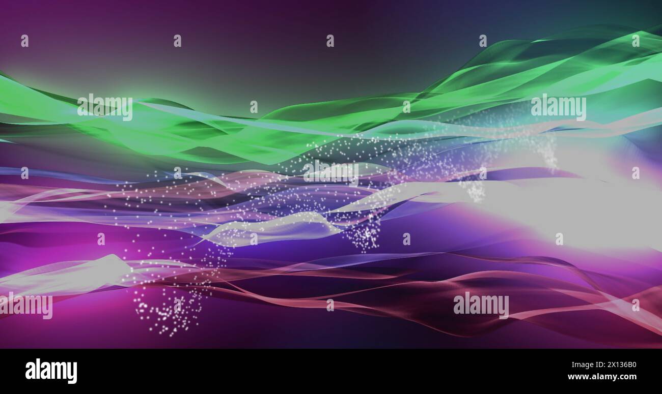 Image of white particles spinning on a blue and black background to ...