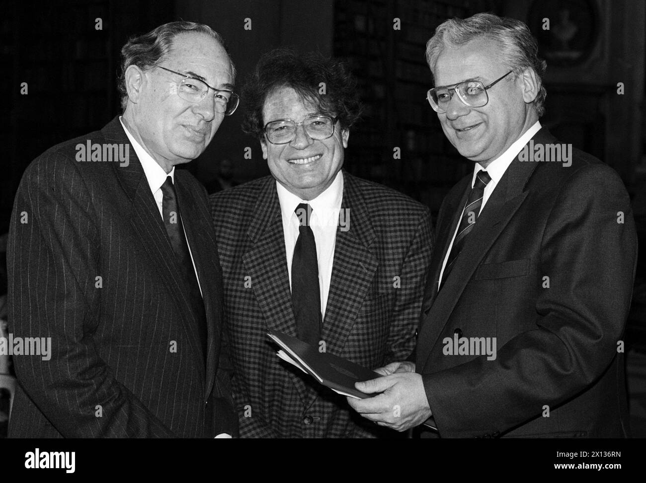Vienna on October 2nd 1990: Minister Erhard Busek (r.) hands over the ...
