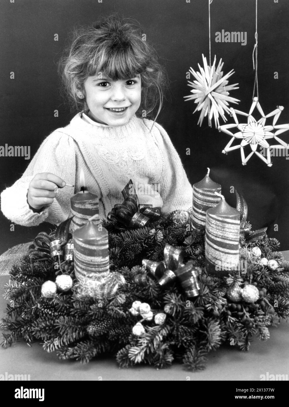 Feature Advent: Little Daniela lights the first candle of her Advent ...