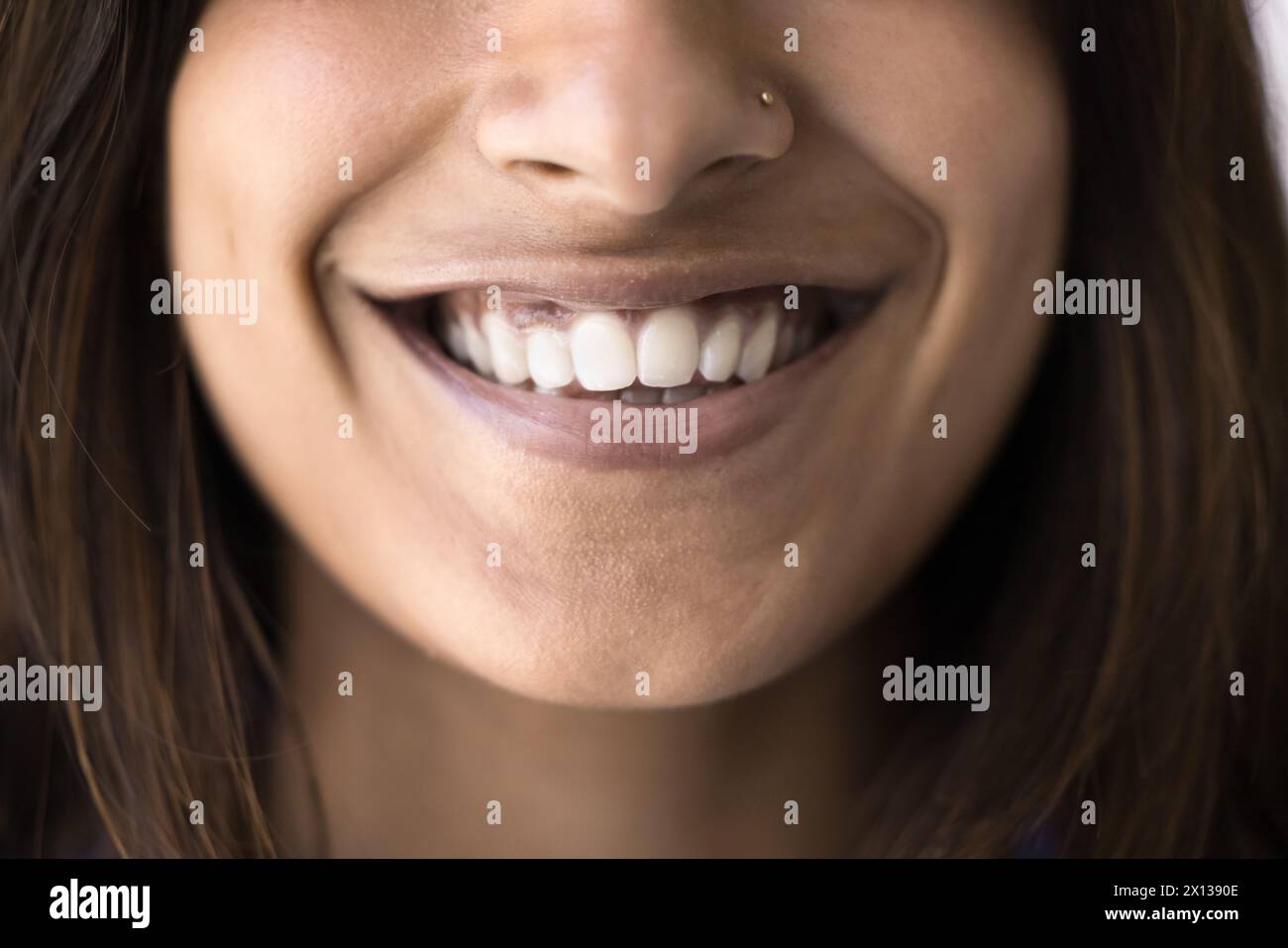 Toothy smile close up of happy young Indian woman Stock Photo - Alamy