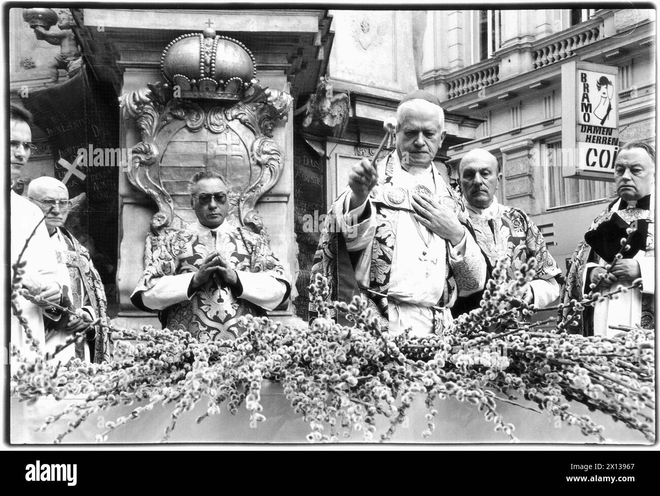 Austrian cardinal Hans-Hermann Groer consecrating palm branches at the ...