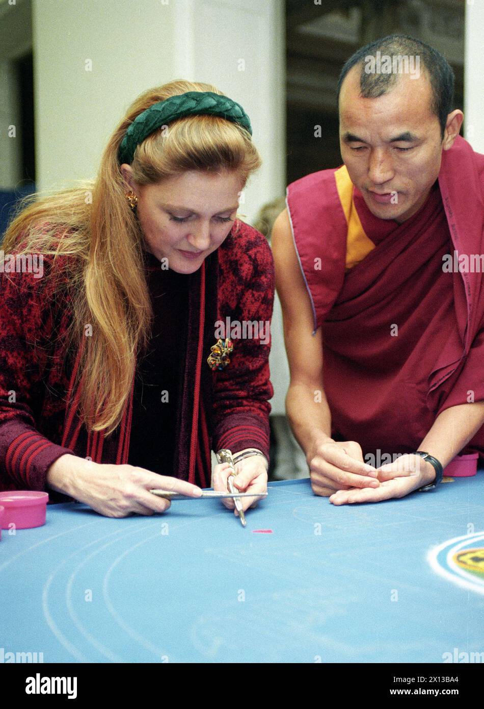 Francesca Thyssen-Bornemisza tries to make a mandala with the help of a ...