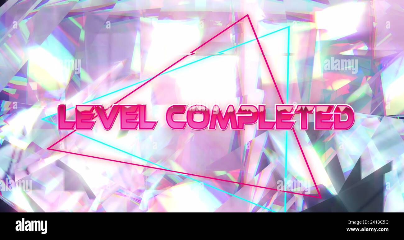 Image of level completed text over glowing crystal Stock Photo - Alamy