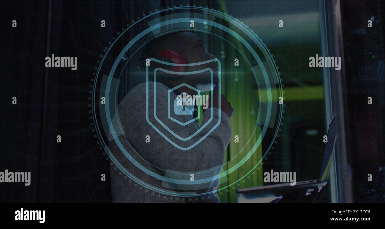 Image of cyber security text and padlock in circle, african american ...