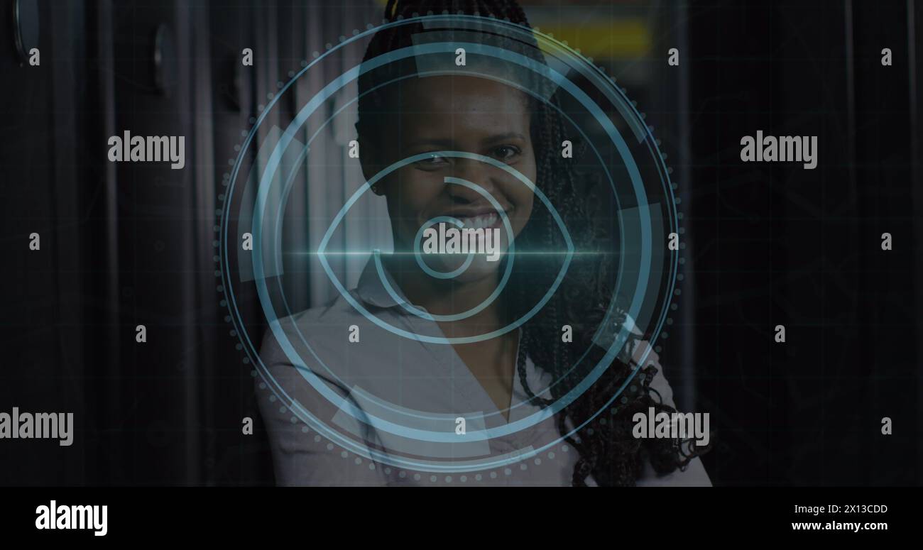 Image of eye retina scanner over african american female engineer ...