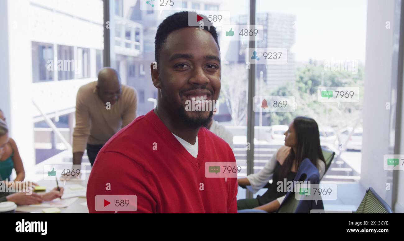 Image of multiple notification bars over smiling african american man ...