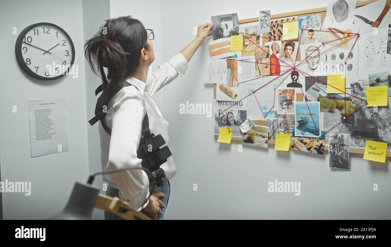 Mature hispanic woman in detective office analyzing crime evidence ...