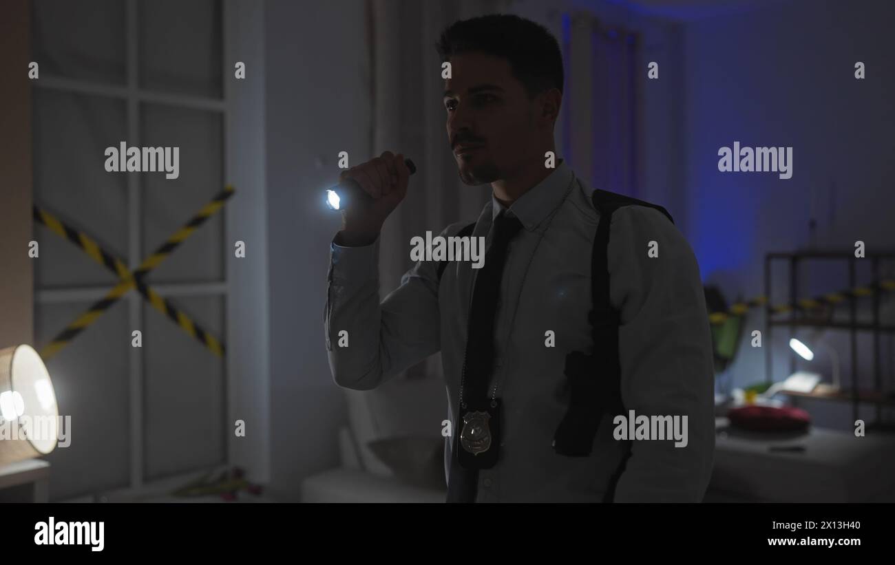 Hispanic detective man investigates indoor crime scene at night Stock ...