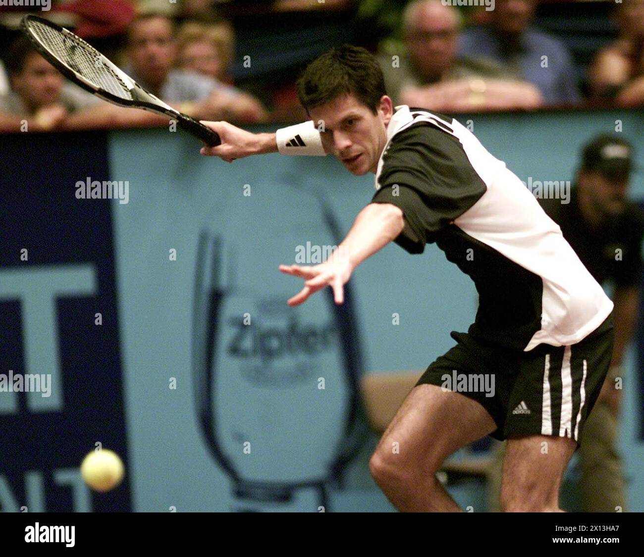 Tennis player Tim Henman (GB) in action during the match against Roger ...