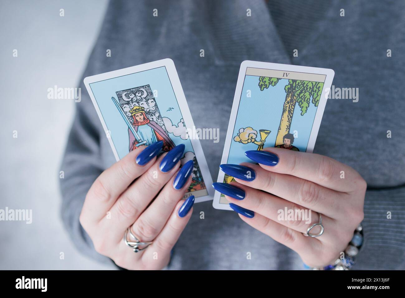 Female hands holding tarot cards for fortune telling and tricks Stock ...