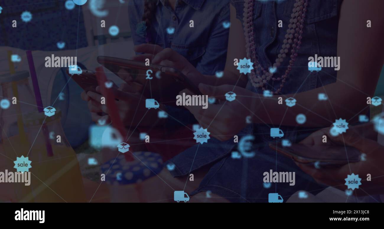 Image of web of connections with icons floating over a group of people ...