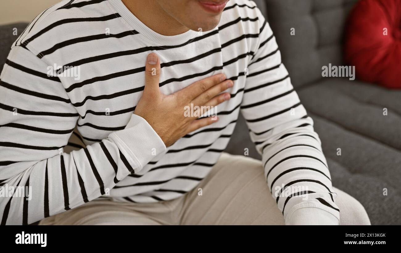 Hispanic man's struggle, suffering heart attack at home, hands ...