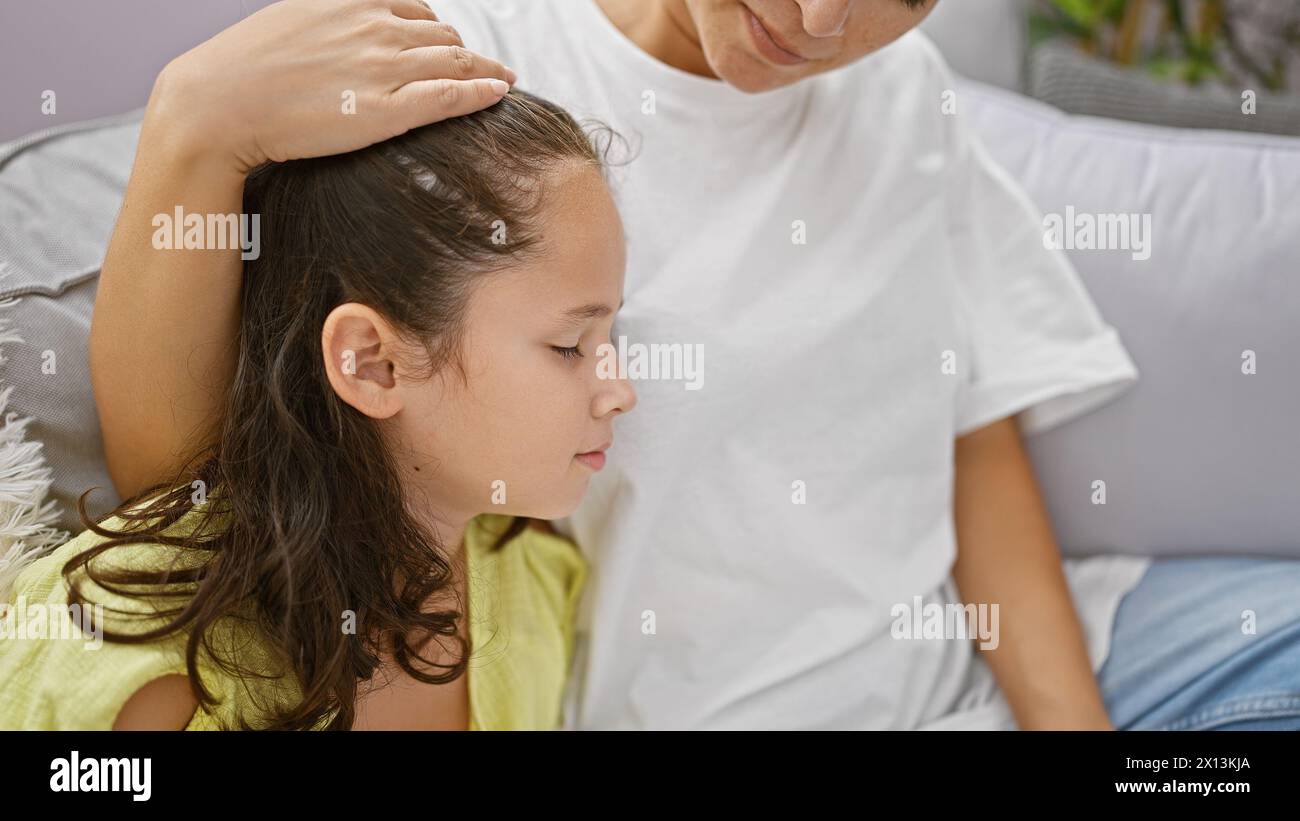 Mother and daughter's beautiful bonding moment, hugging each other ...