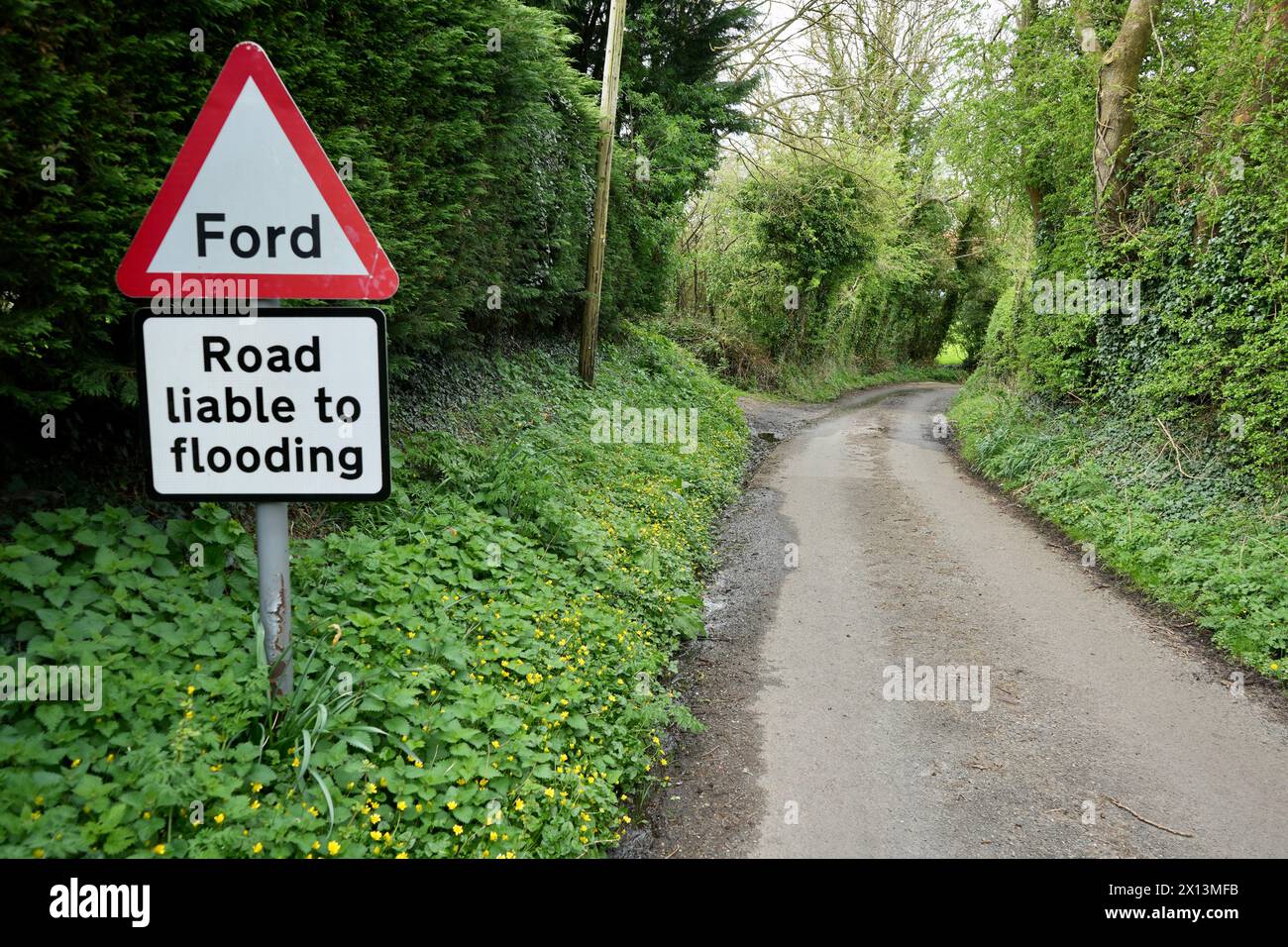 Road sign for a Traditional British Ford, where a river crosses a road ...