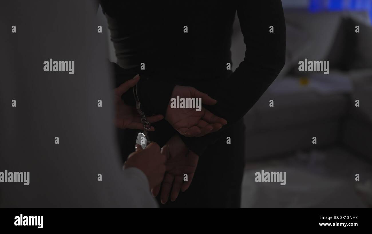 Woman police handcuffed a man hi-res stock photography and images - Alamy