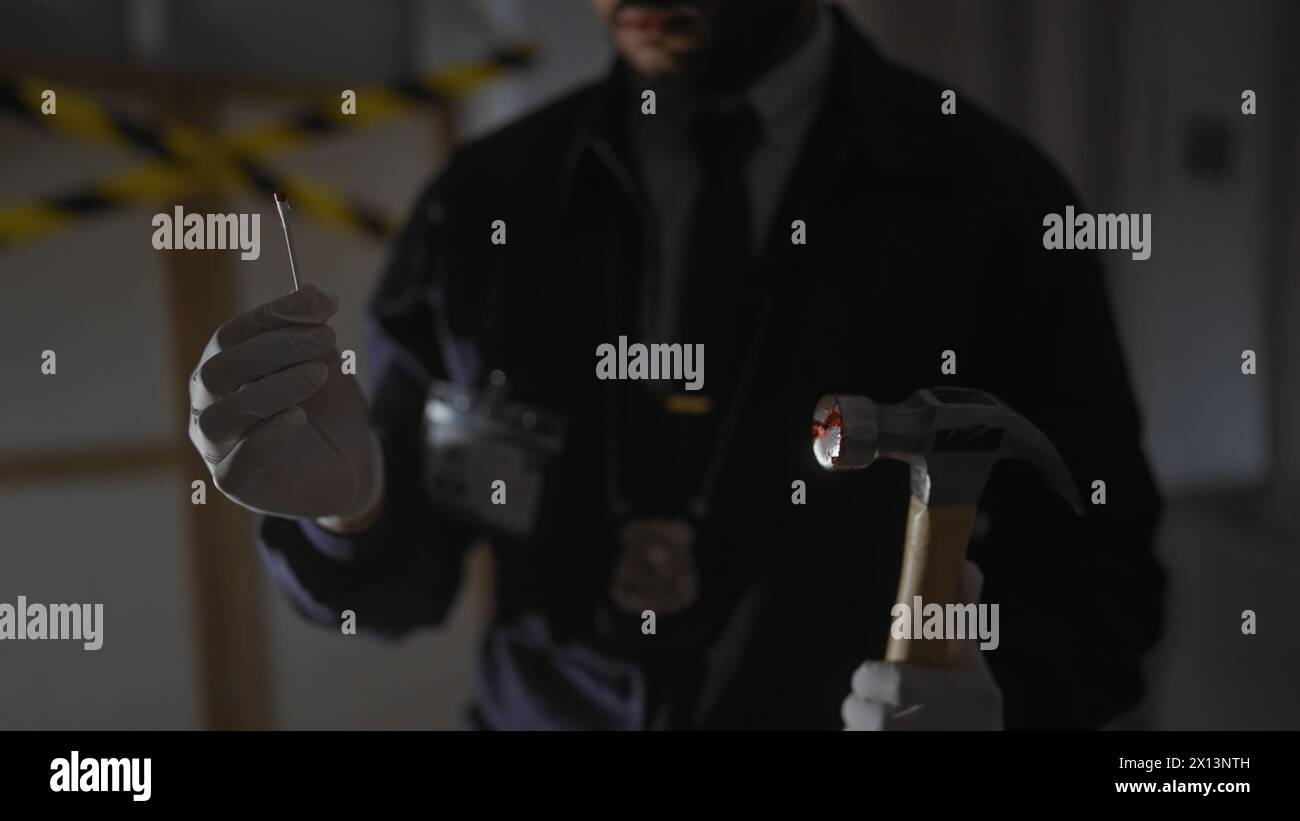 An african american man inspects evidence at a crime scene indoors ...