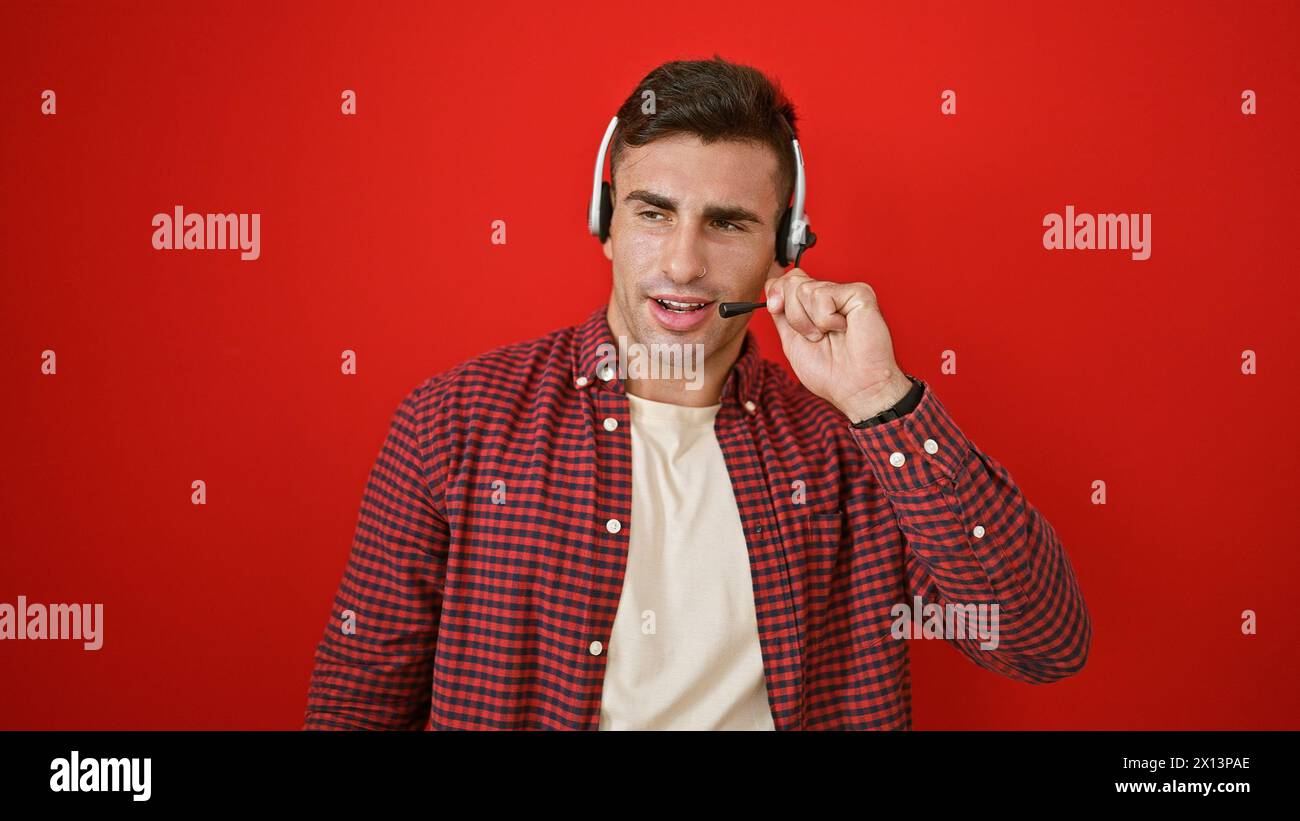 Dashing young hispanic man smiling wide, emanating confidence as a ...