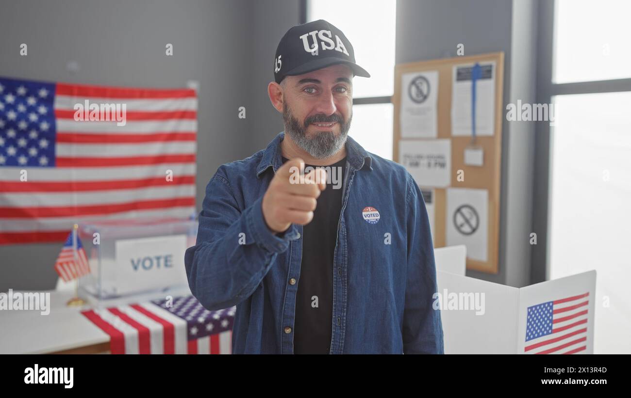 Bearded man pointing in a voting station with american flags and 'vote ...