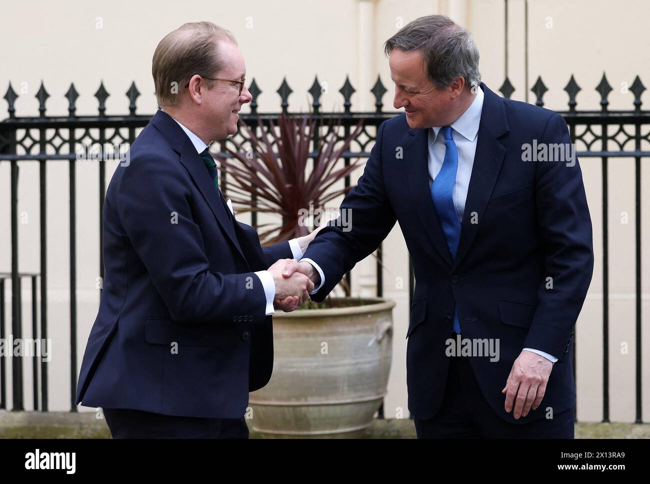 Foreign Secretary Lord David Cameron (right)greets Swedish Minister for ...