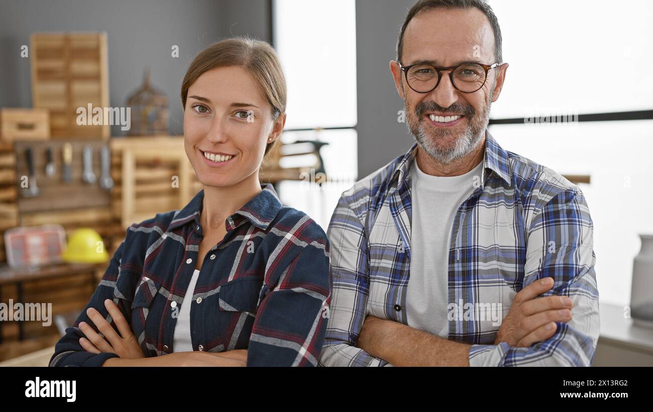 Two smiling carpenters man woman hi-res stock photography and images ...
