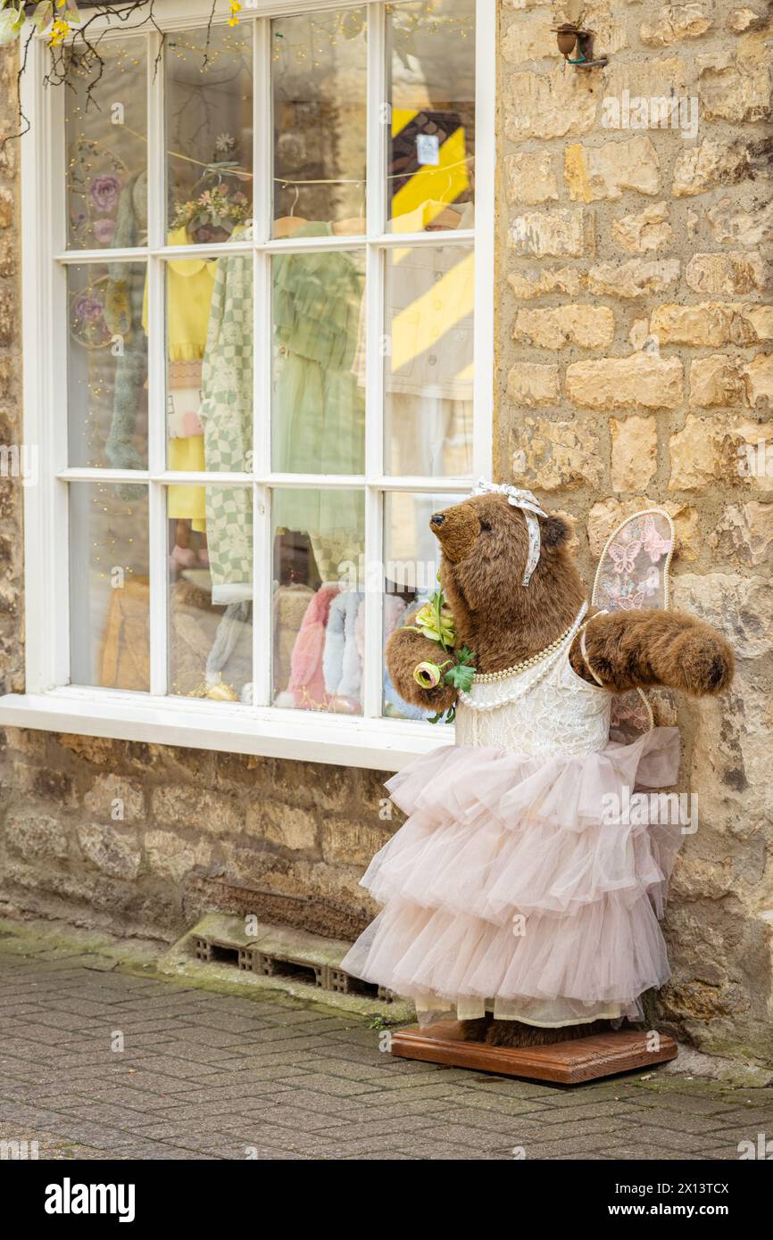 A big brown bear wearing a dress makes for an eye catching promotional ...