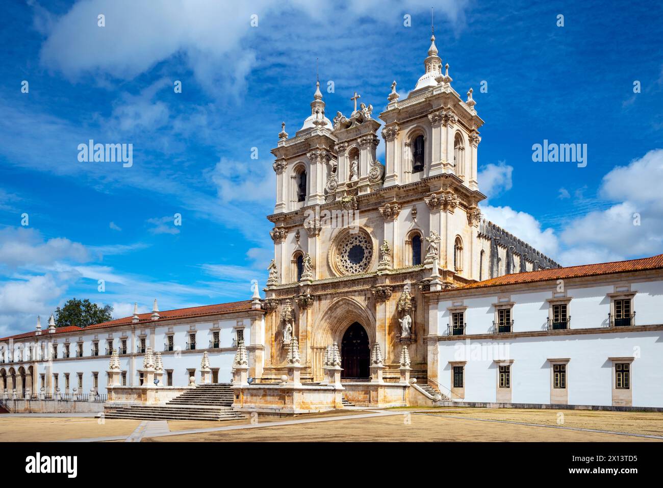 The grand exterior of the Alcobaça Monastery (Mosteiro de Alcobaça) or ...