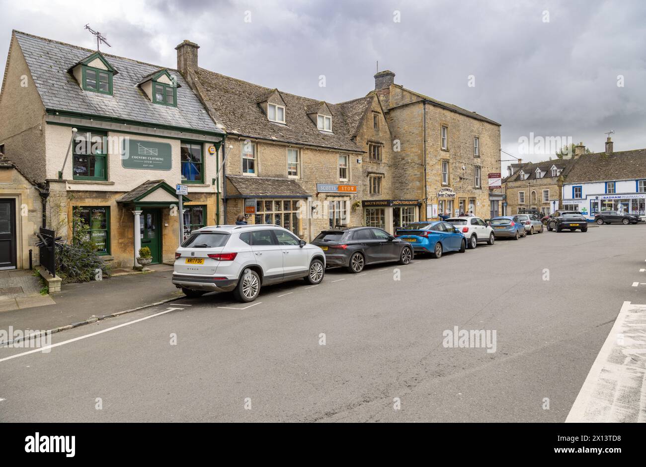A charming Stow on the Wold street lined with Cotswold stone shops and ...