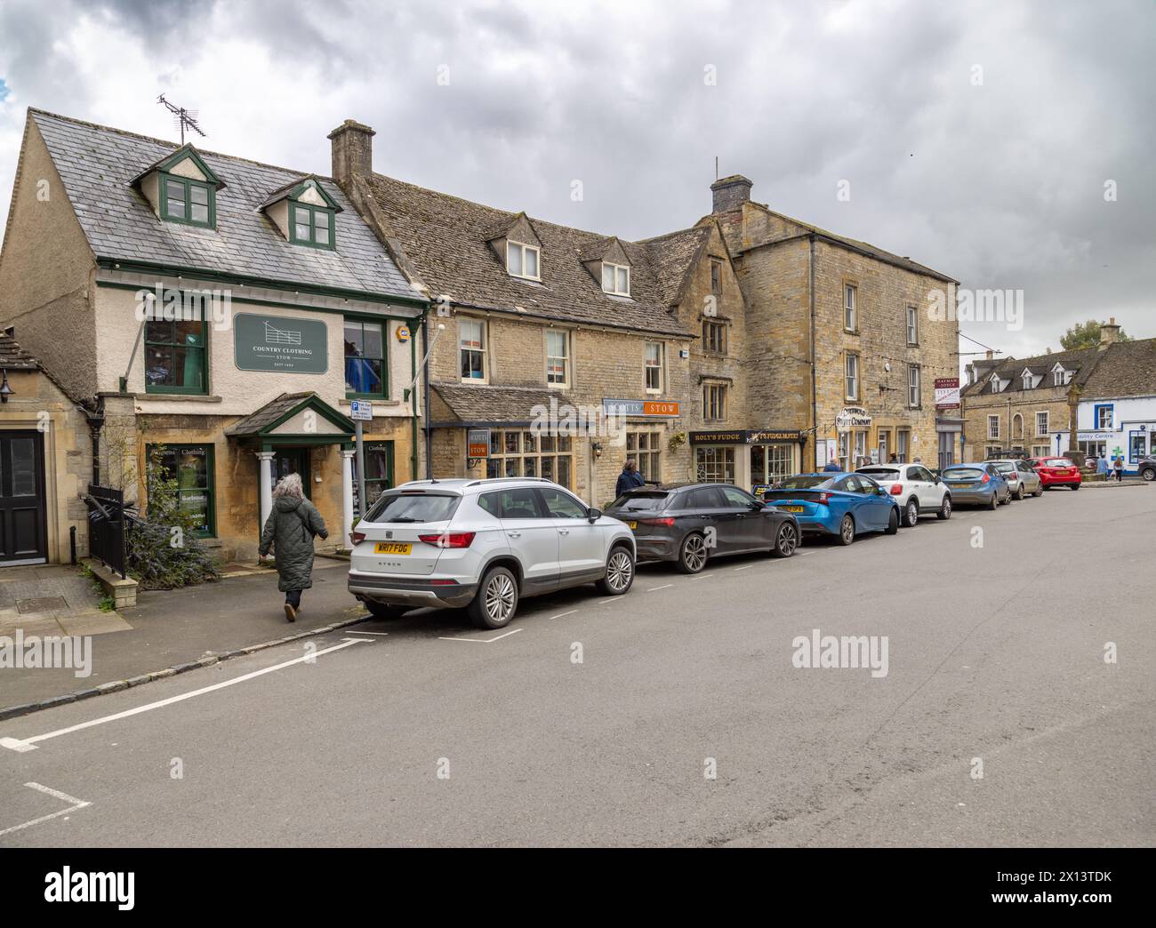 A charming Stow on the Wold street lined with Cotswold stone shops and ...