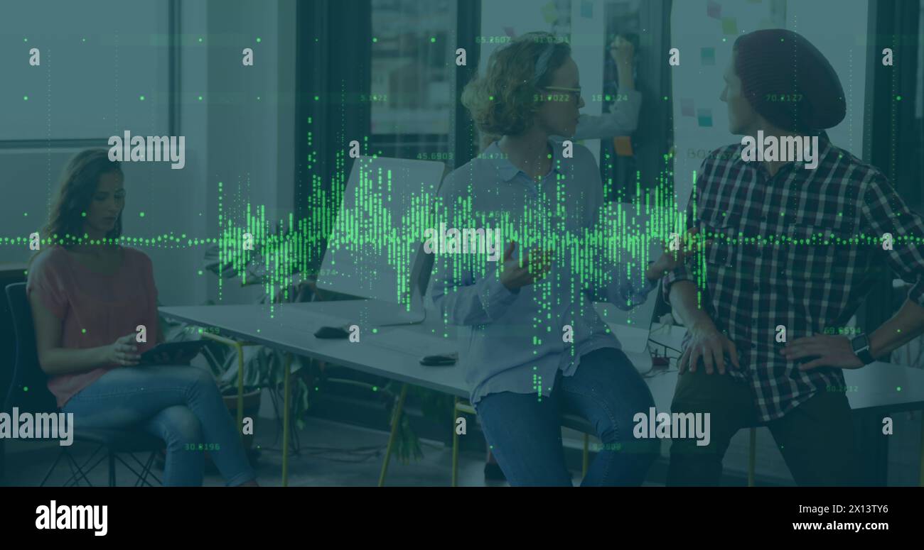 Image of data processing over diverse female and male colleagues ...
