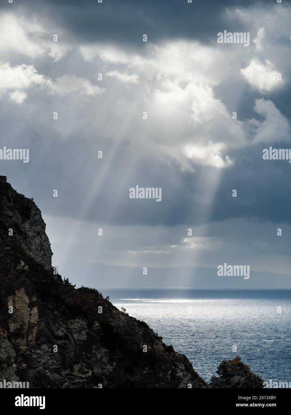 beams of sun hit the ocean Stock Photo - Alamy