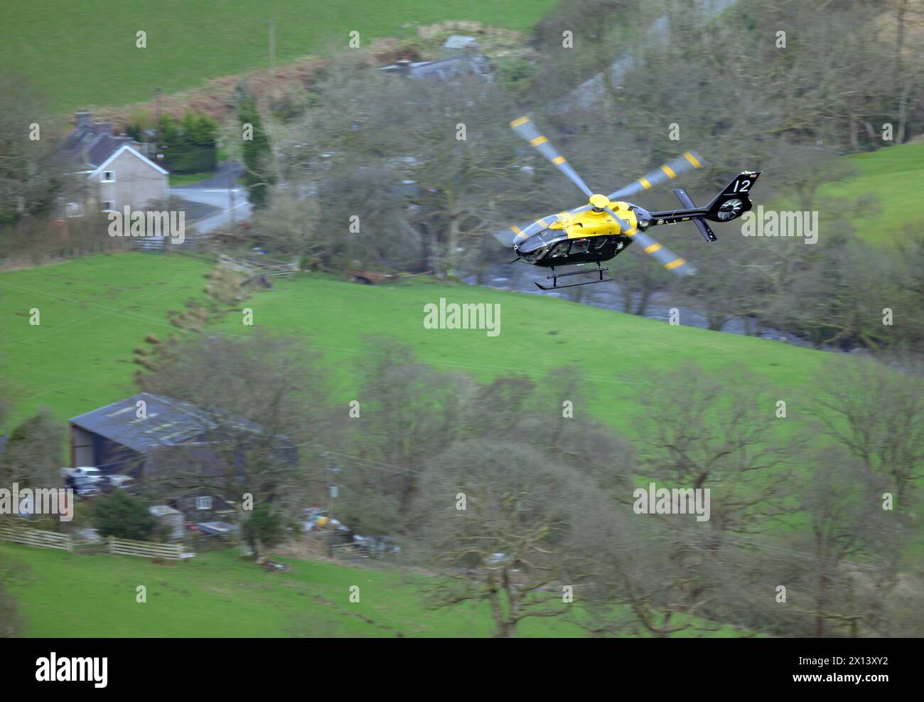 Royal Air Force Juno HT1 Helicopter flying low level in Wales Stock ...