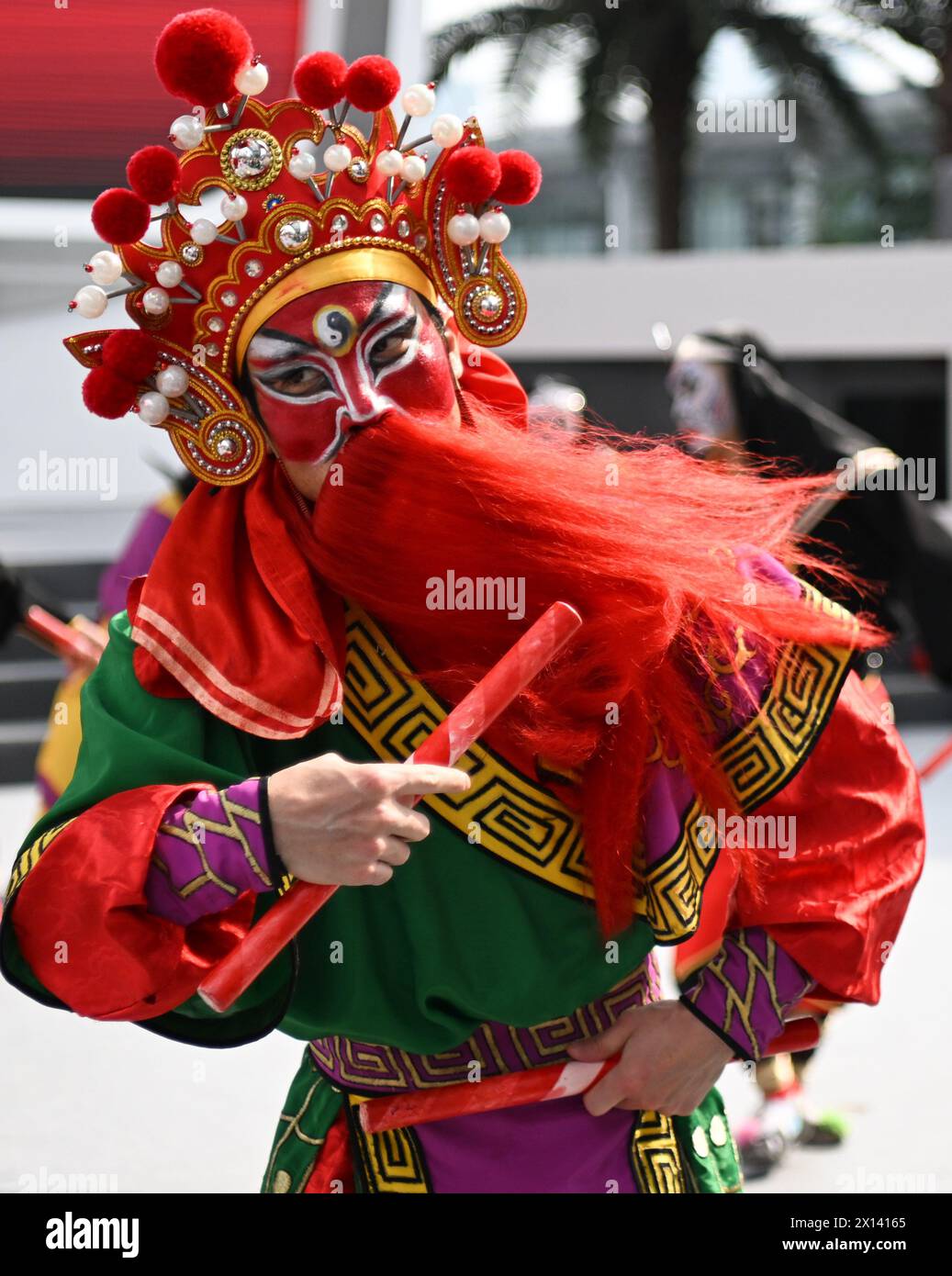 Guangzhou. 15th Apr, 2024. An artist performs Yingge Dance, a form of ...