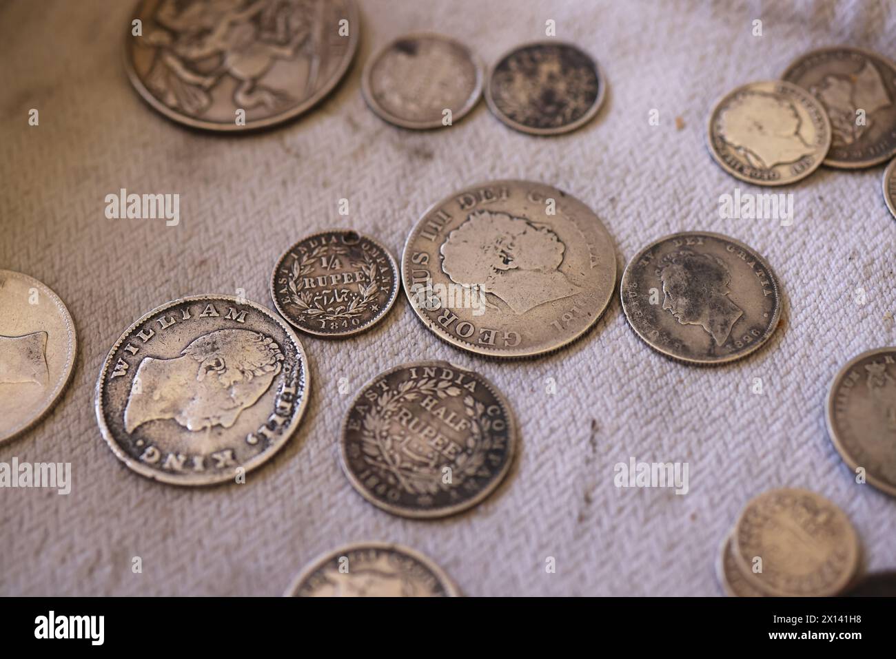A selection of old British coins on a table at the Weald & Downland ...