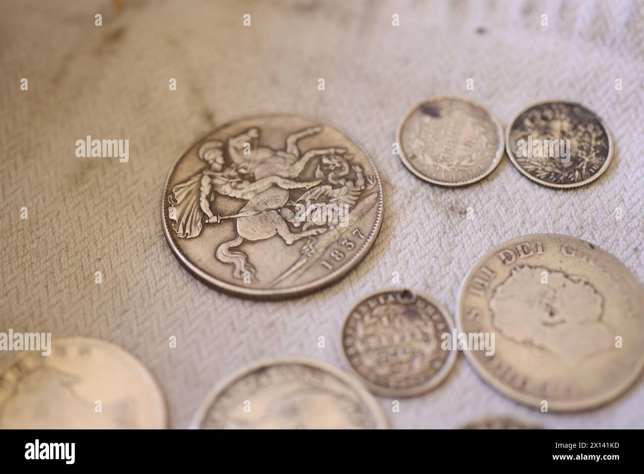 A selection of old British coins on a table at the Weald & Downland ...