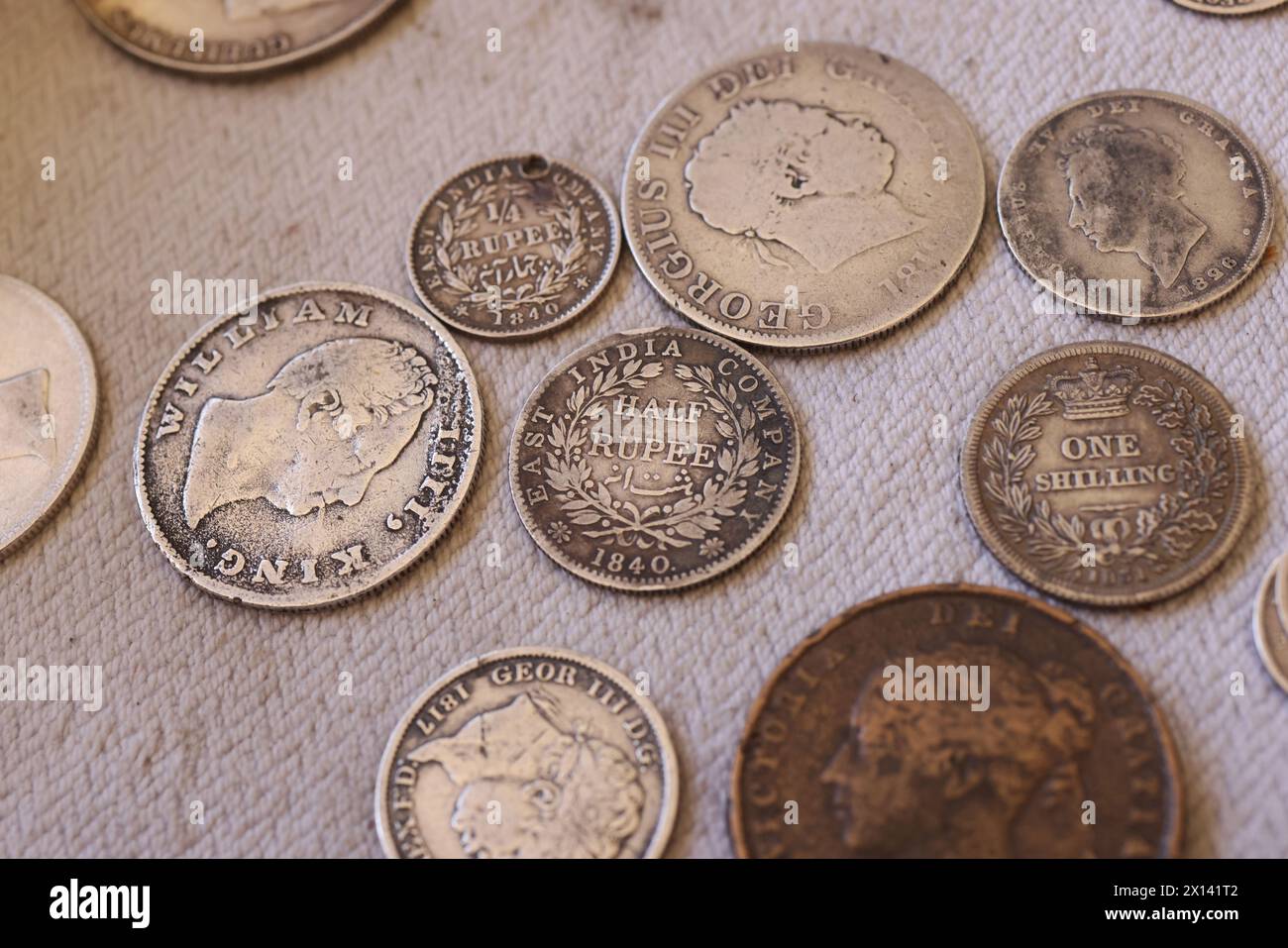 A selection of old British coins on a table at the Weald & Downland ...