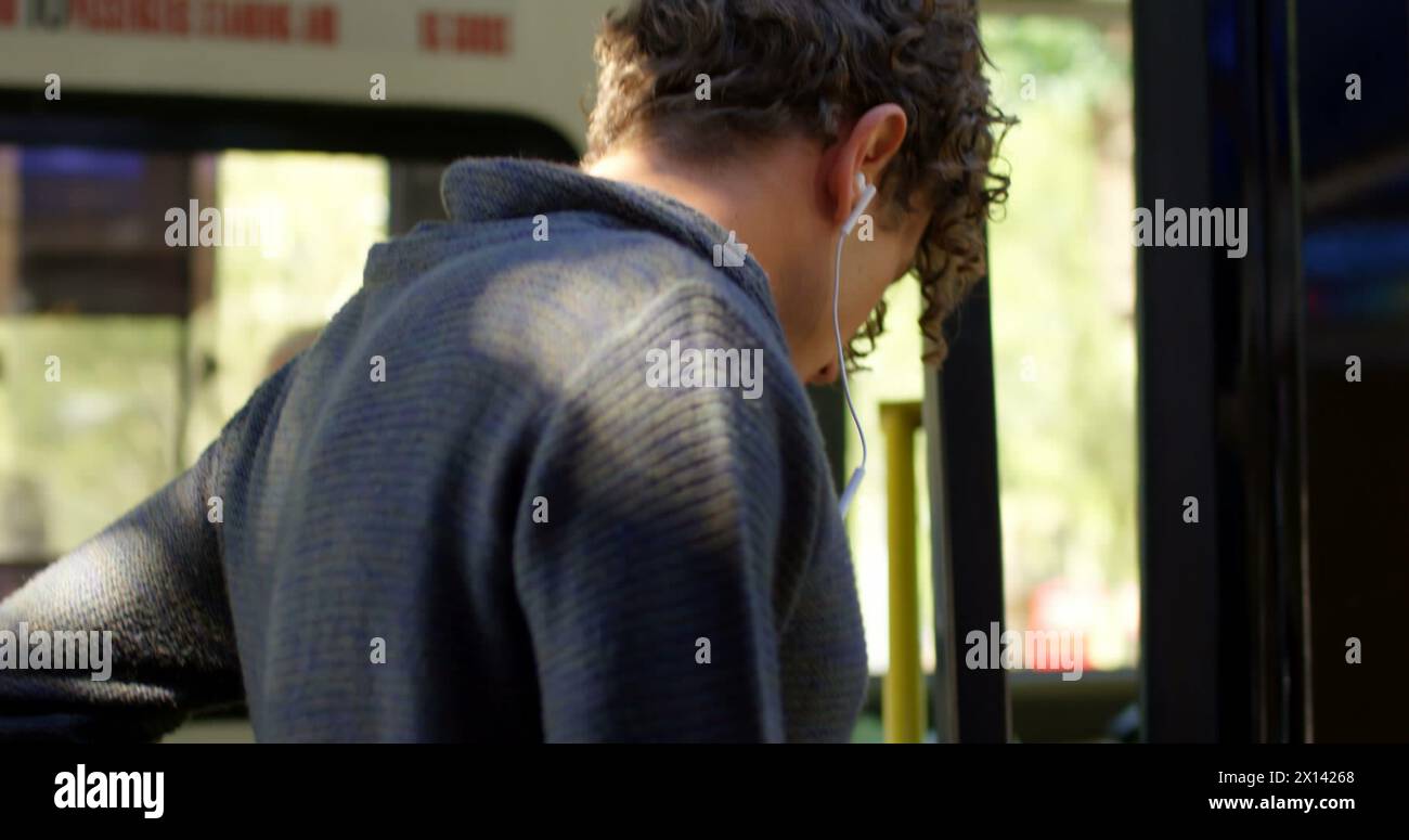 Multiple thumbs up icons floating against caucasian boy using ...