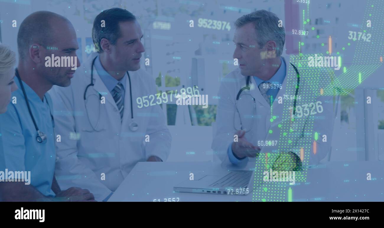 Image of financial data processing over diverse doctors Stock Photo - Alamy