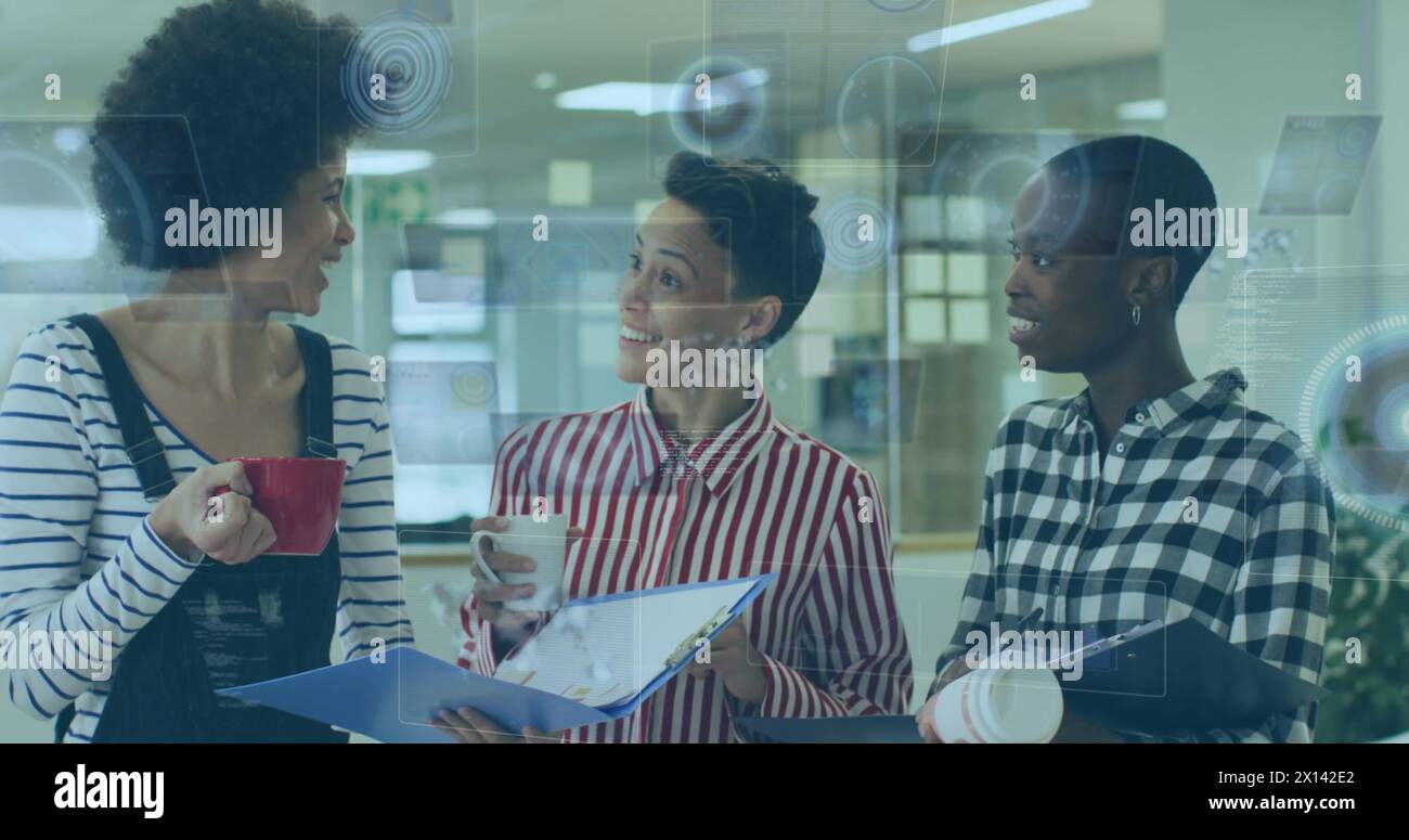 Image of hud processing over multiracial female colleagues discussing ...