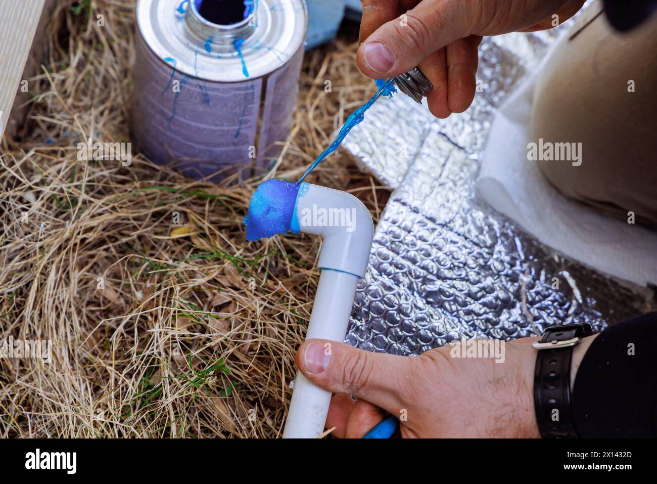 Before gluing pvc plastic pipe, plumber seals it with glue Stock Photo ...