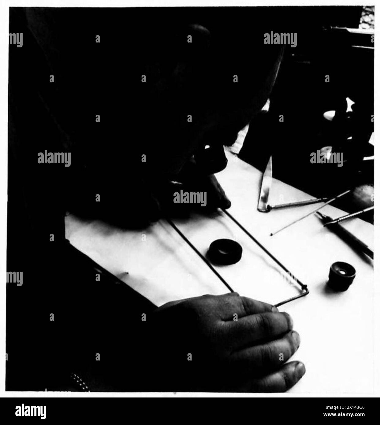 SPIDERS WEB IN USE BY THE ARMY - Cpl. S. Rogers fitting a fresh web to ...